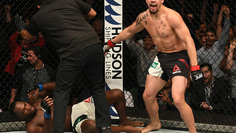 Whittaker ends epic first round with TKO | UFC